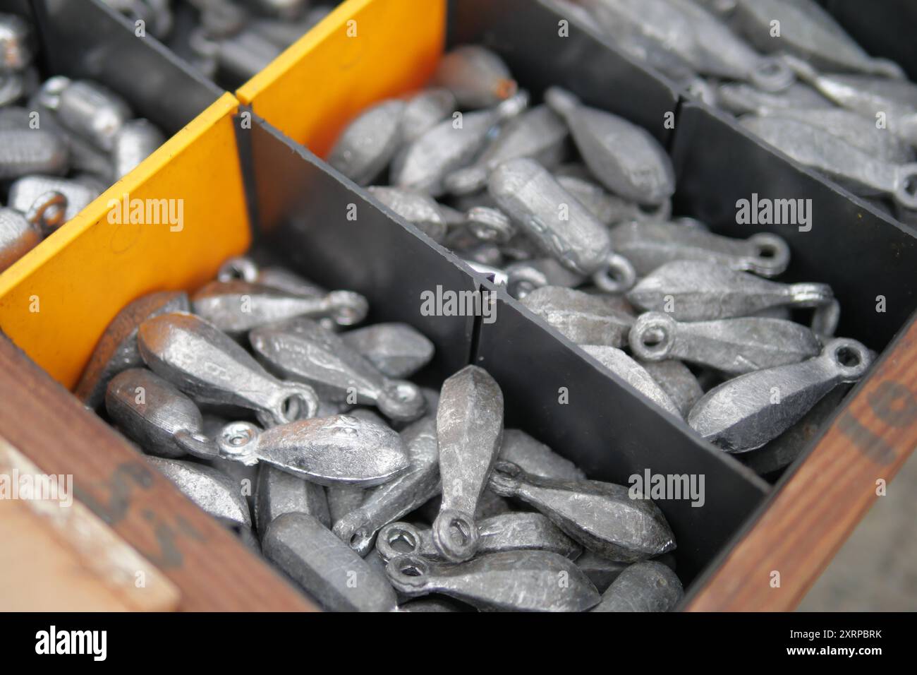 A Comprehensive Collection of Fishing Weights Insid a Box for All Your ...