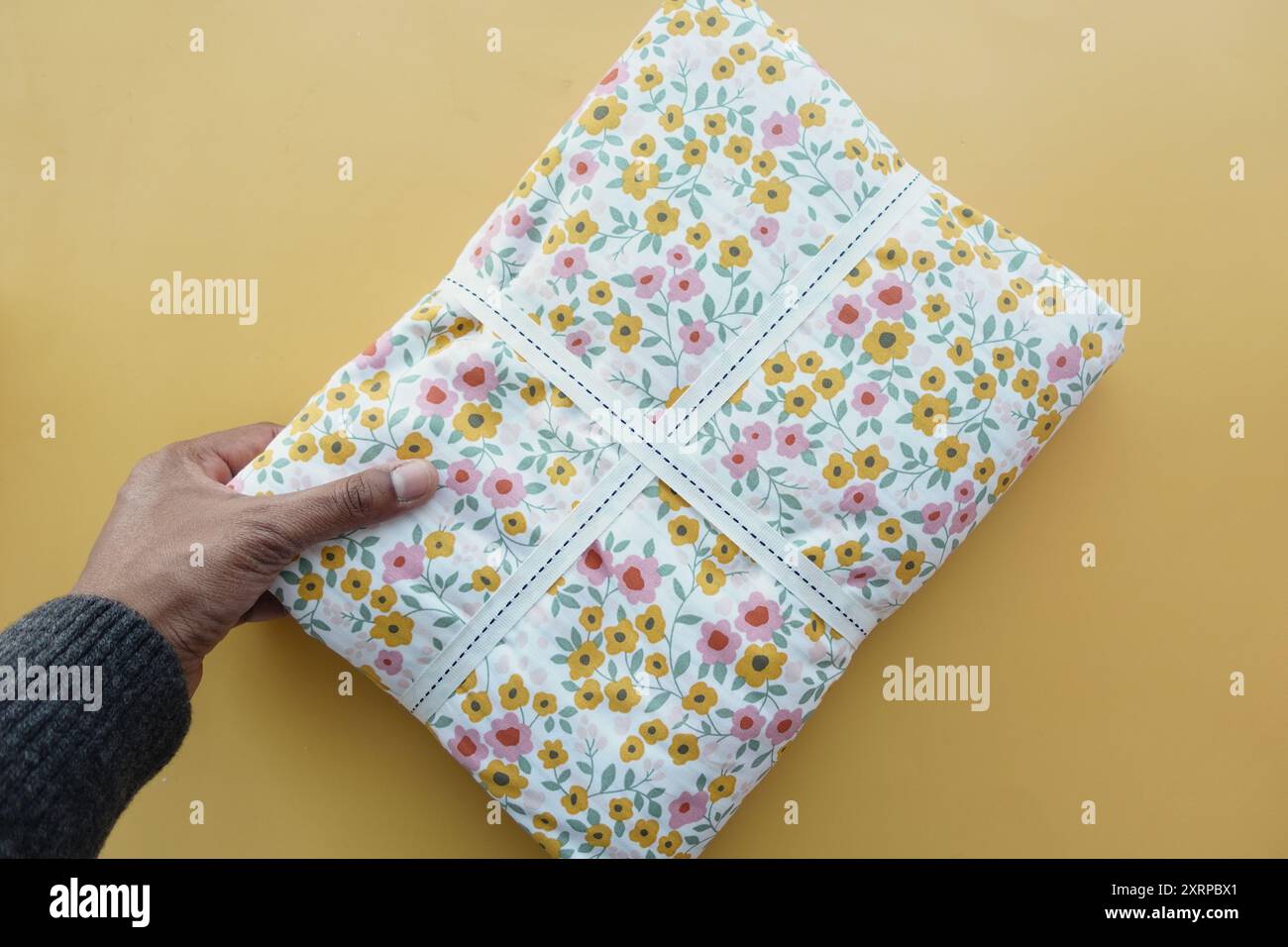 A collection of floral fabric pieces displayed beautifully on a vibrant ...