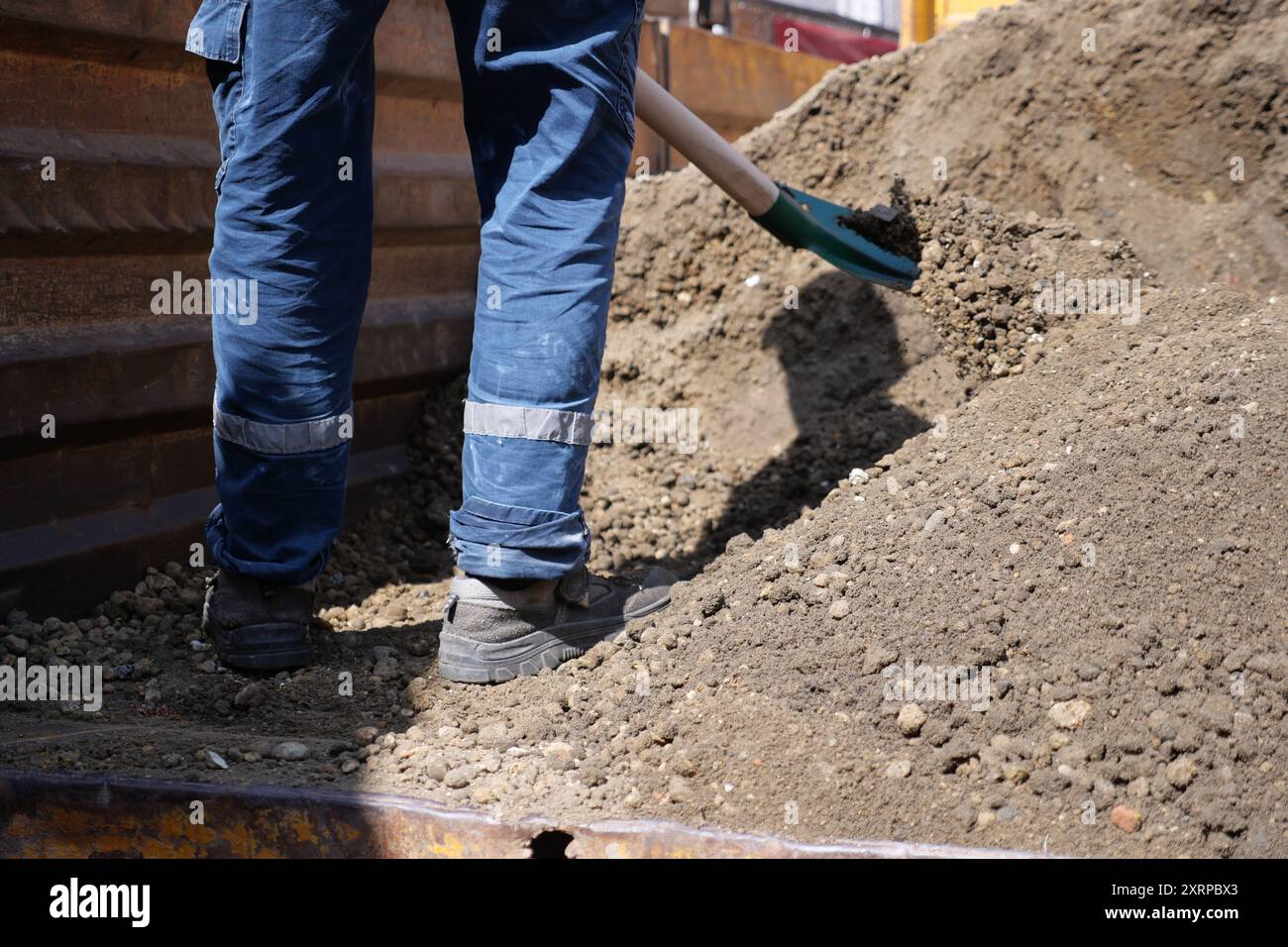 Person digging with shovel hi-res stock photography and images - Alamy