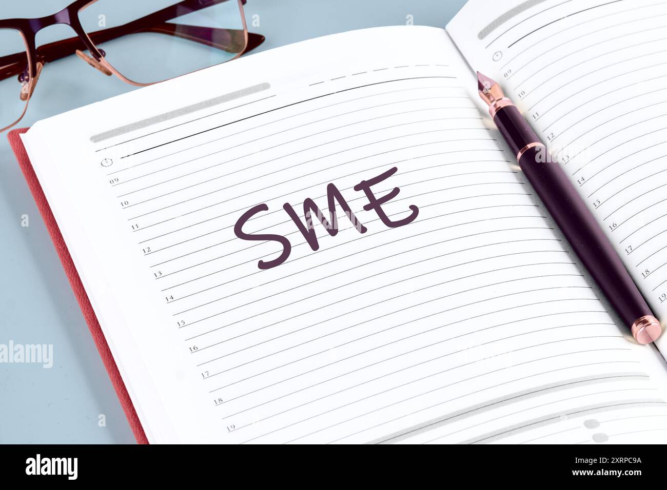 SME, small and medium enterprise. SME in the notebook of a businessman ...