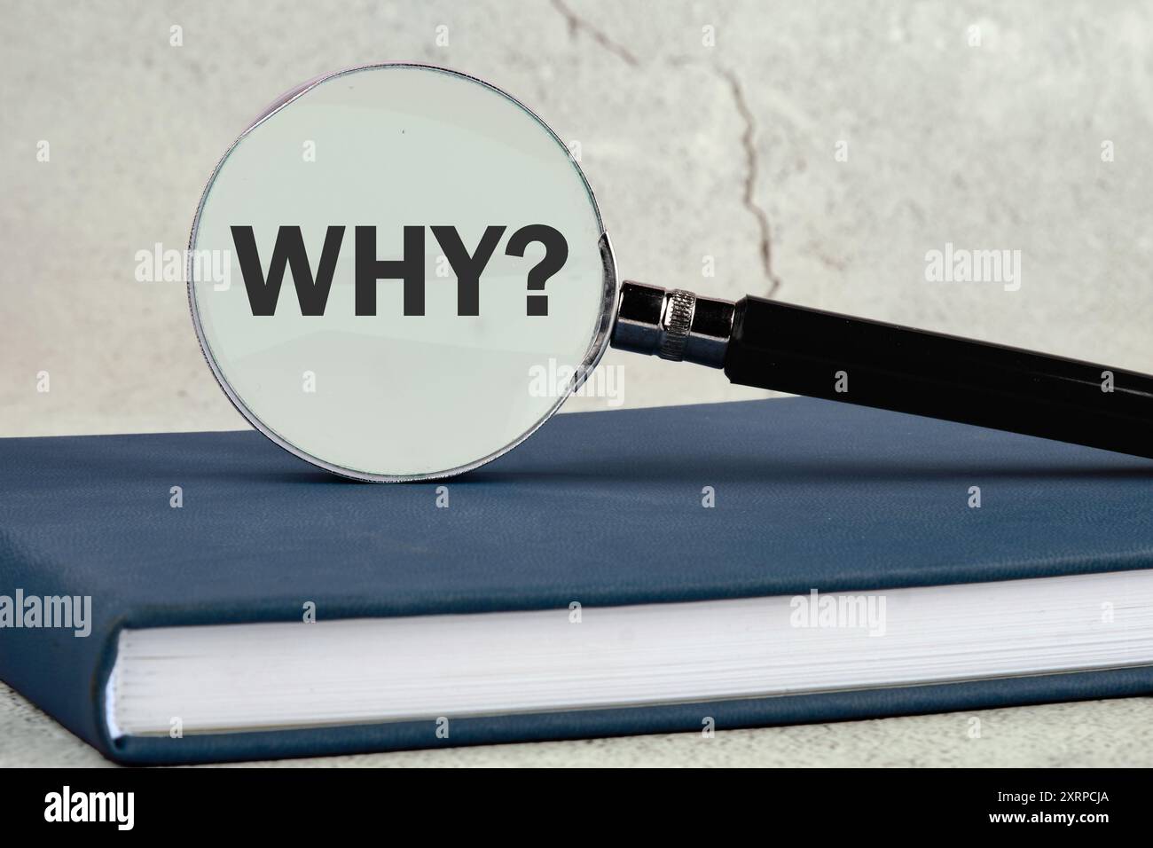 WHY alphabet letters through a magnifying glass located on a business ...