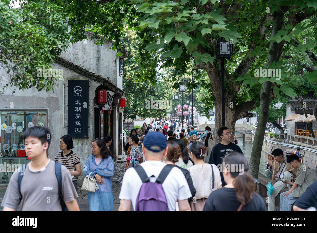 Suzhou, China - June 11, 2024 : A bustling street scene in Suzhou ...