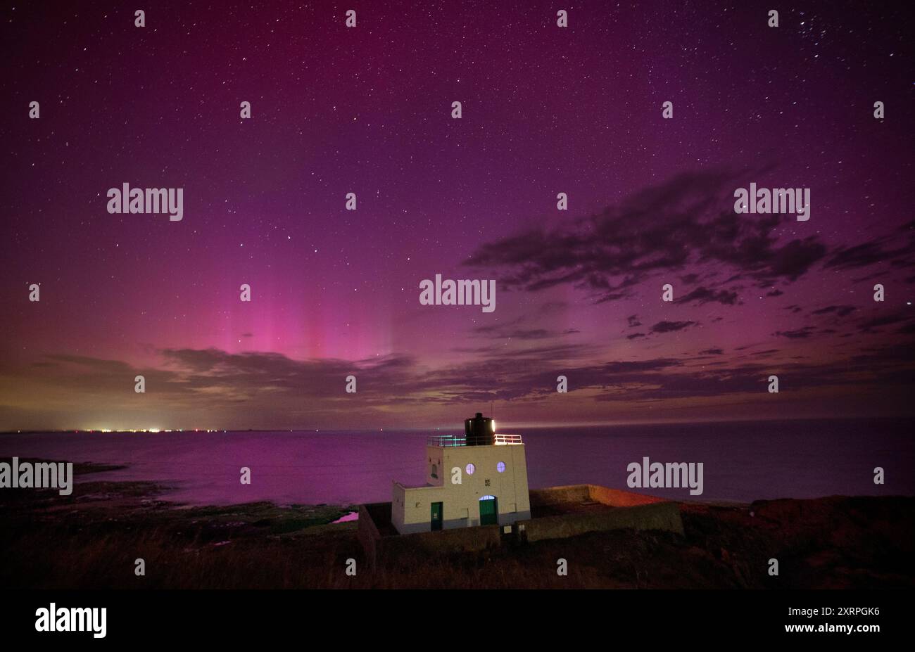 The aurora borealis, also known as the northern lights, appears over ...