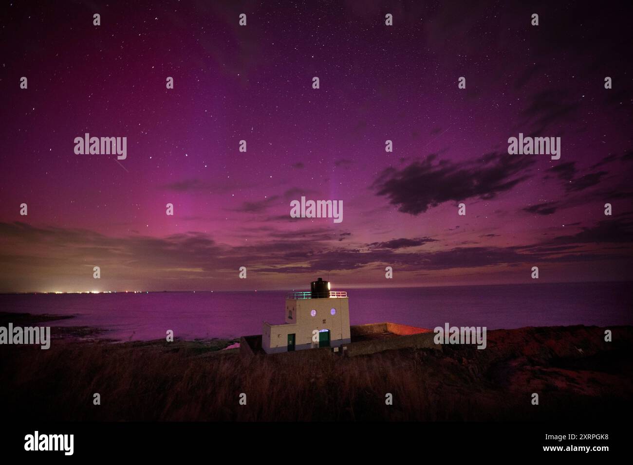 The aurora borealis, also known as the northern lights, appears over ...