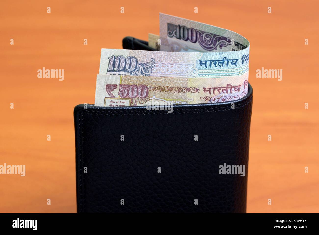 Indian rmoney - rupees in the black wallet Stock Photo - Alamy