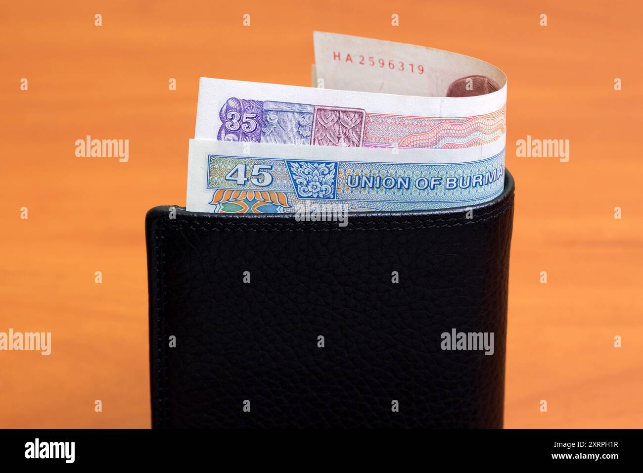 Old Myanmar money - Kyat in the black wallet Stock Photo - Alamy