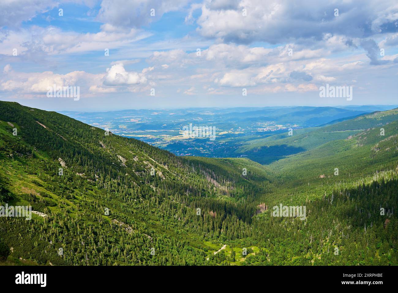 Beautiful panoramic view of green mountain valley with rolling hills ...