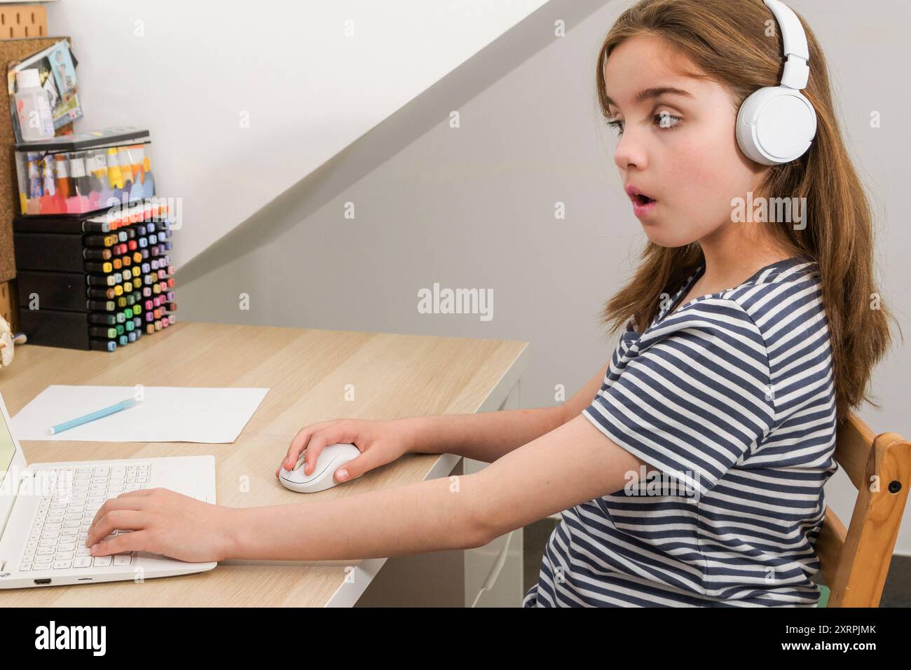 The girl is outraged a warning on the computer. The dangers of the ...