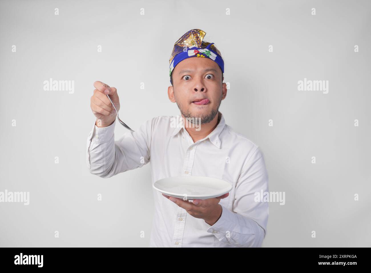 Man is showing yummy with hand gesture hi-res stock photography and ...