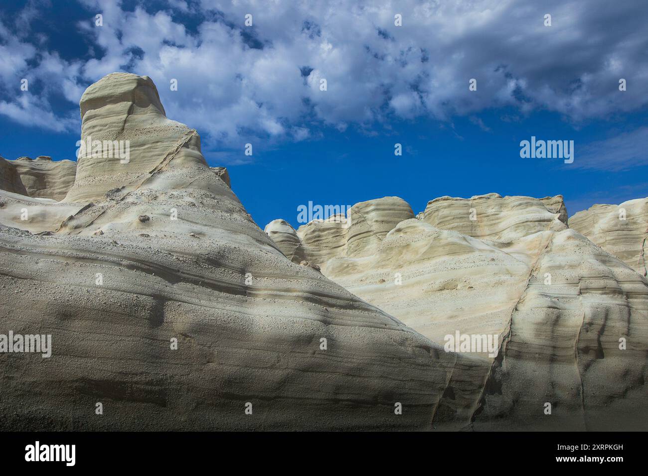beautiful landscape in Milos island, detail of volcanic rock walls at ...