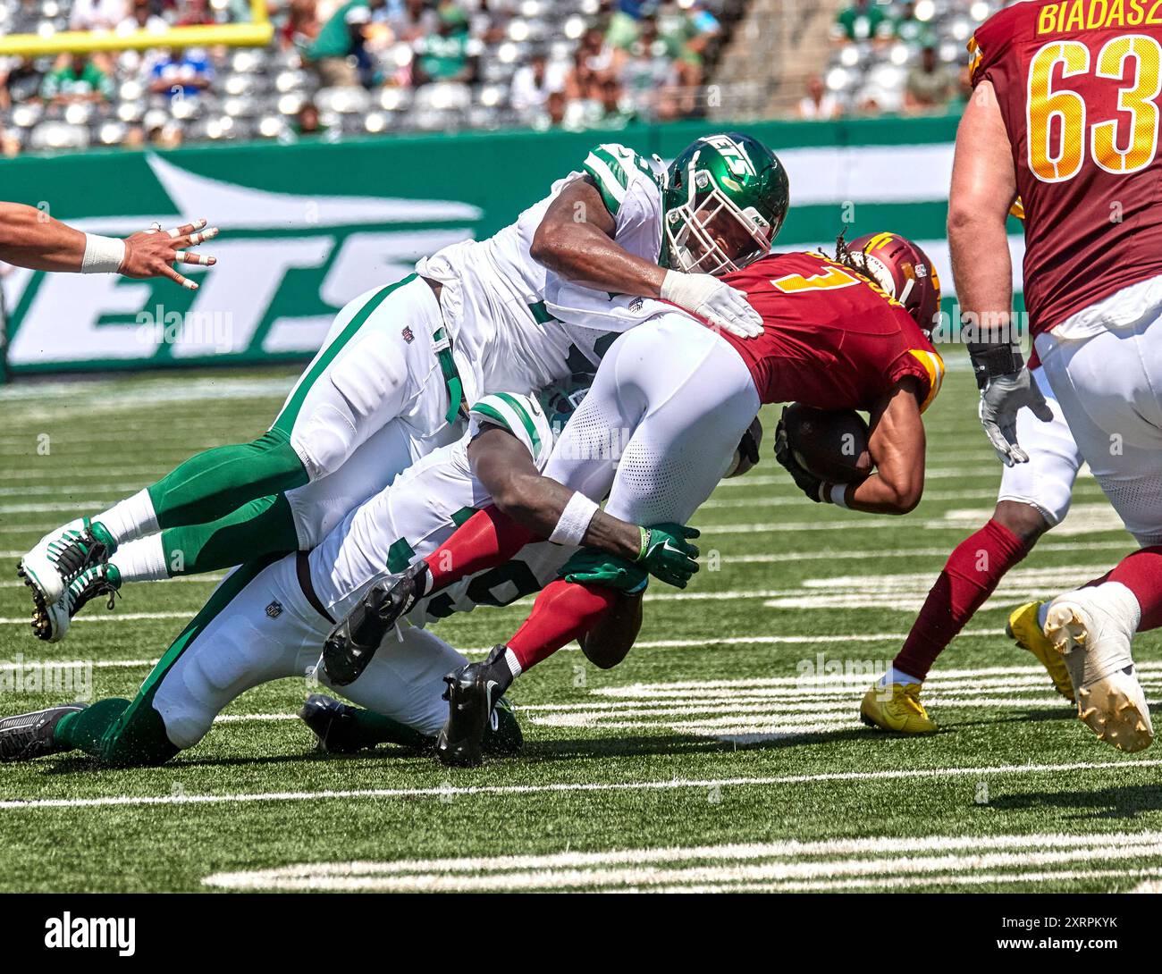 New York Jets safety Jarius Monroe (39) and defensive tackle Tanzel ...