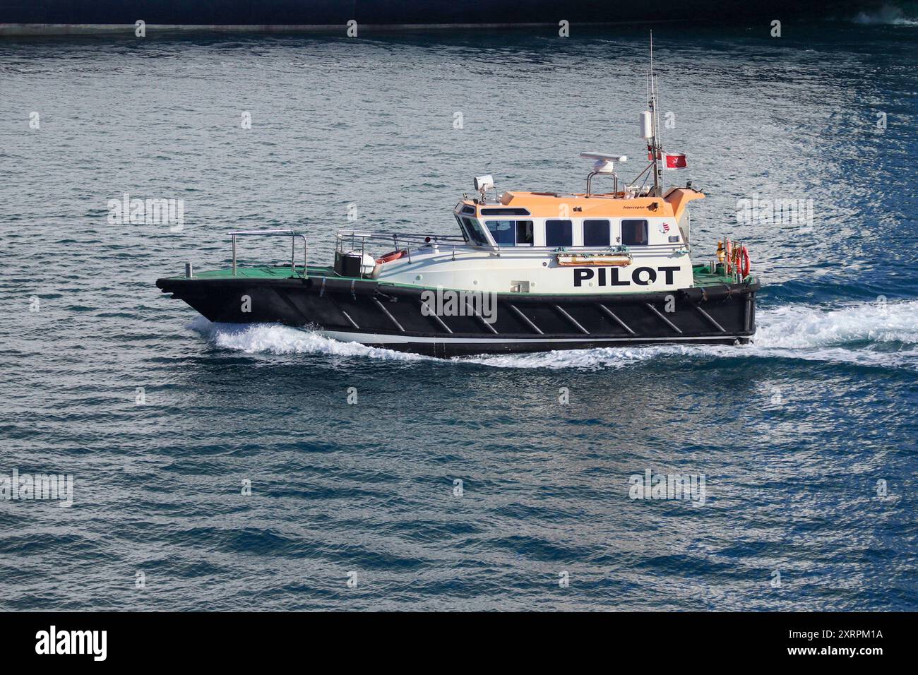 Guiding a cruise ship out of harbour Stock Photo - Alamy