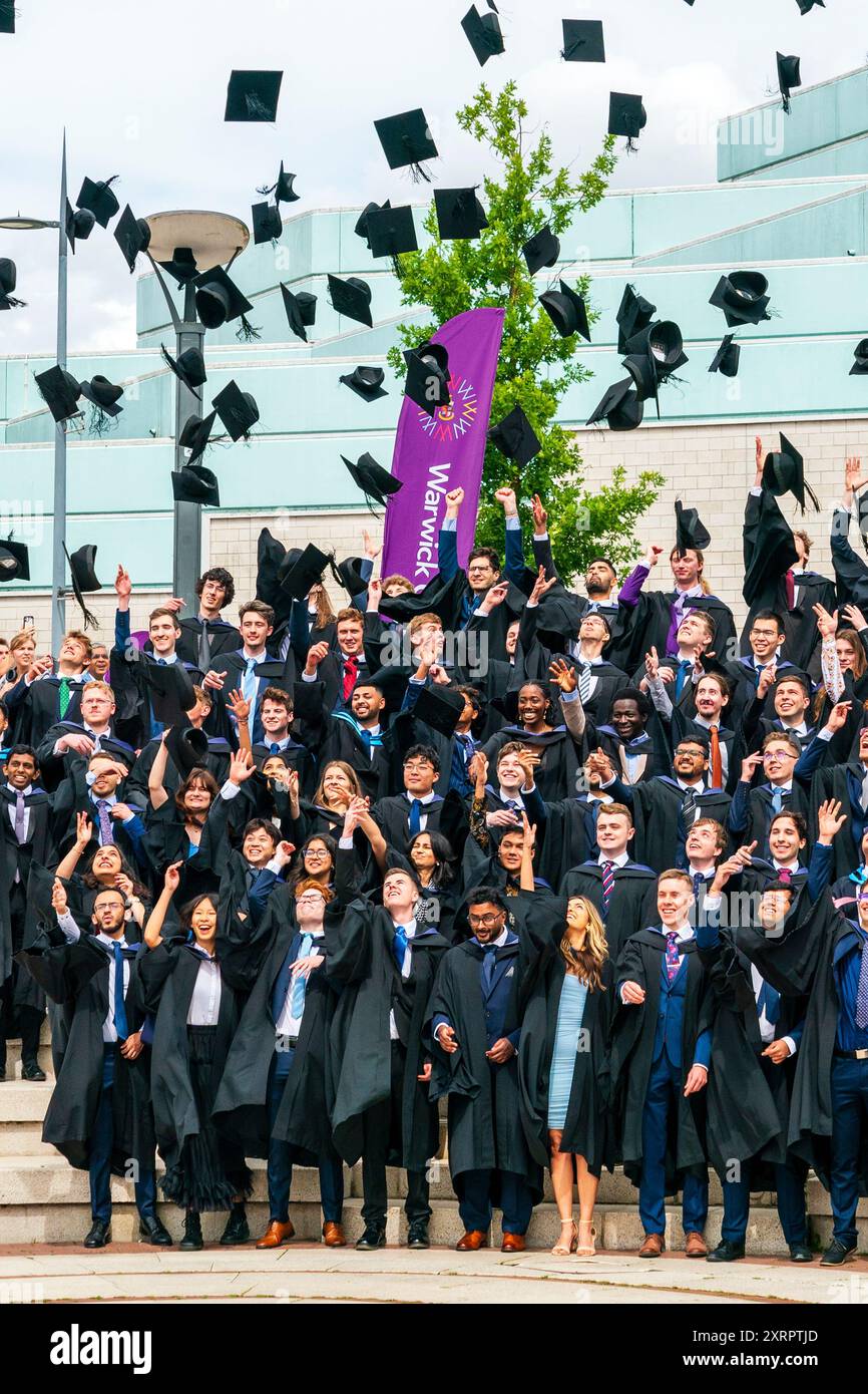 Group of graduates outside Warwick University after graduation ceremony ...