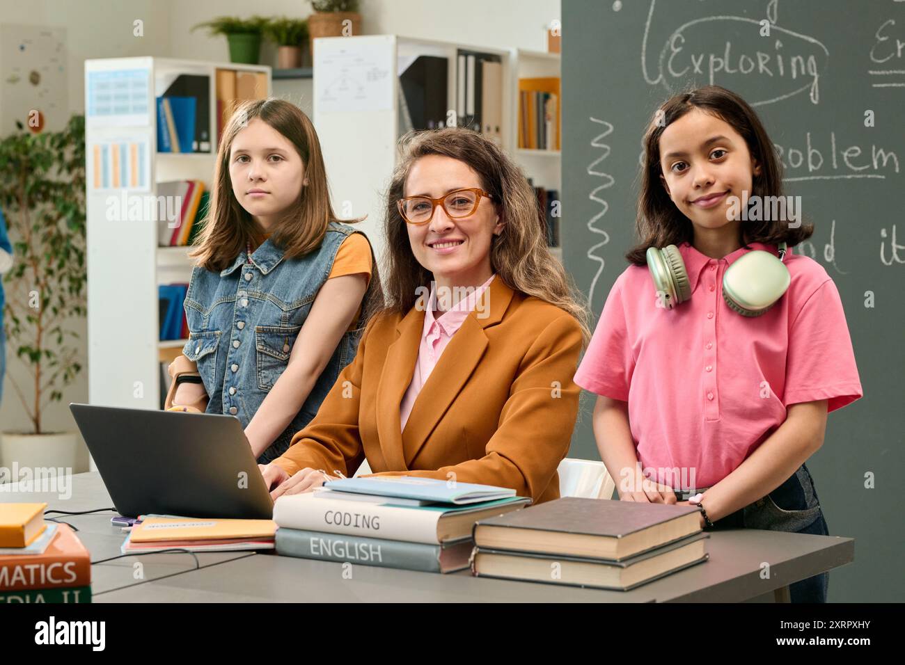 Students teacher look at computer hi-res stock photography and images ...
