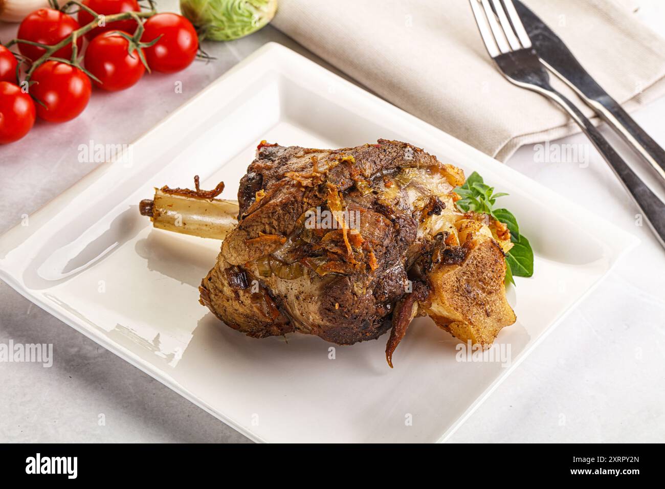 Baked Lamb shank with bone marinated in spices Stock Photo - Alamy