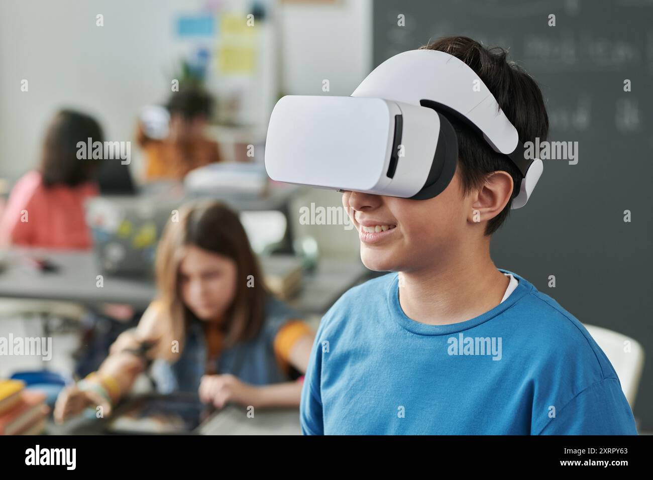 Boy Wearing VR in School Stock Photo - Alamy