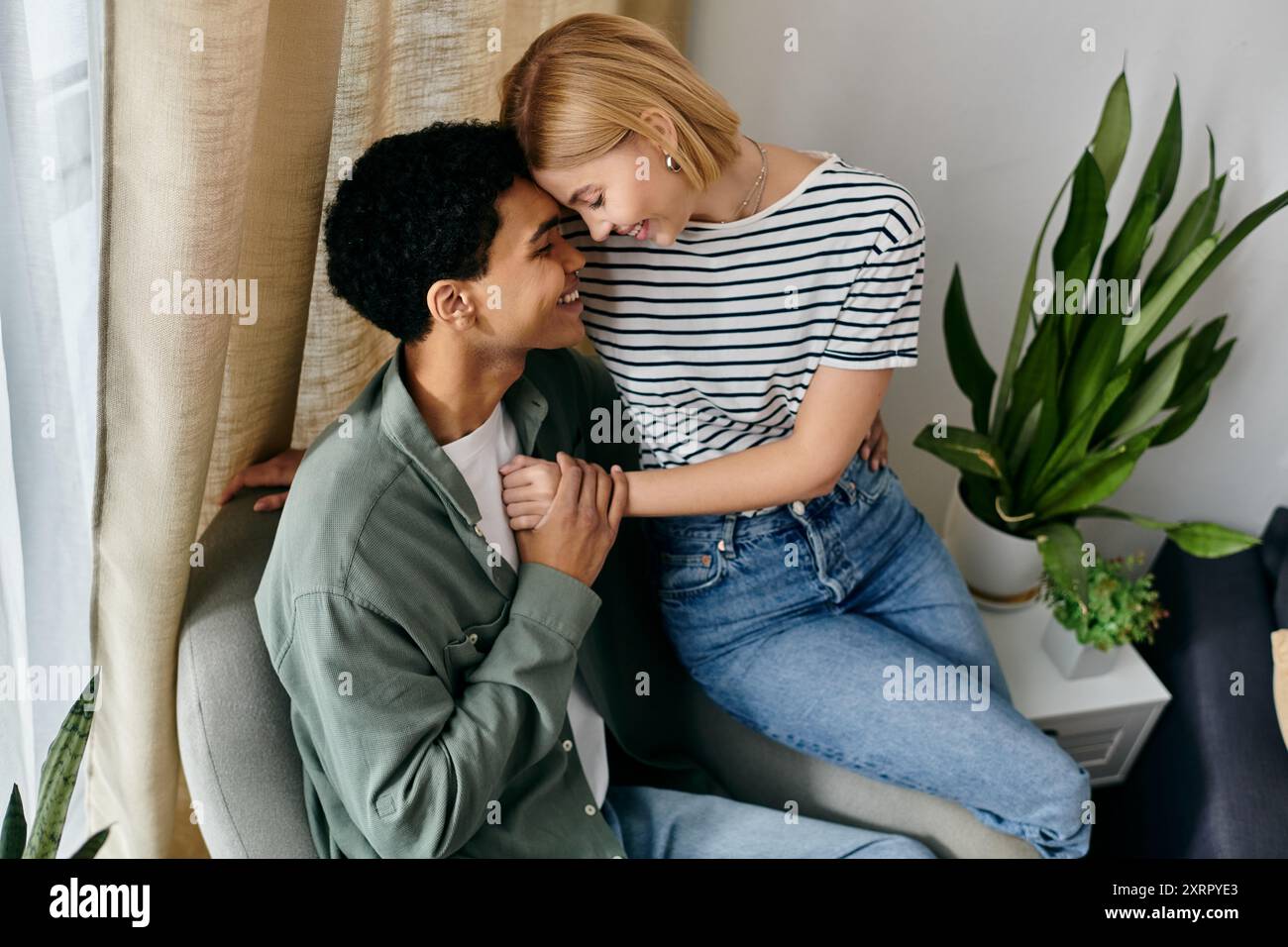 Multicultural couple on genuine hi-res stock photography and images - Alamy