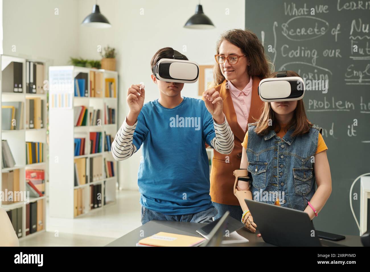 Two Children using VR in School Stock Photo - Alamy