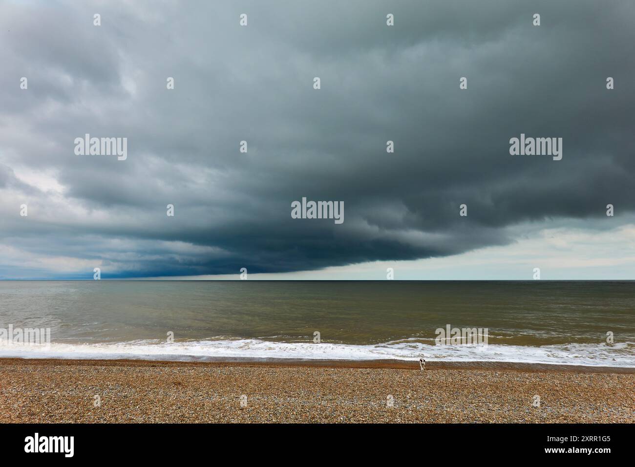 Vivid Coastal Scene with Dramatic Cloud Patterns Over the Ocean at ...