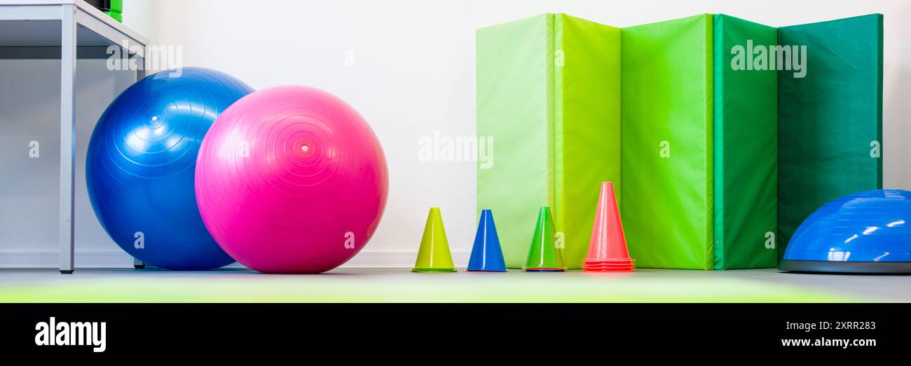 Colorful equipment used in physical therapy sessions. Physiotherapy ...