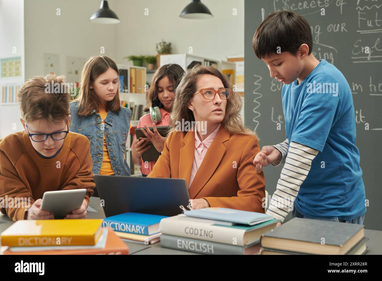 Teacher Talking to Children Stock Photo - Alamy