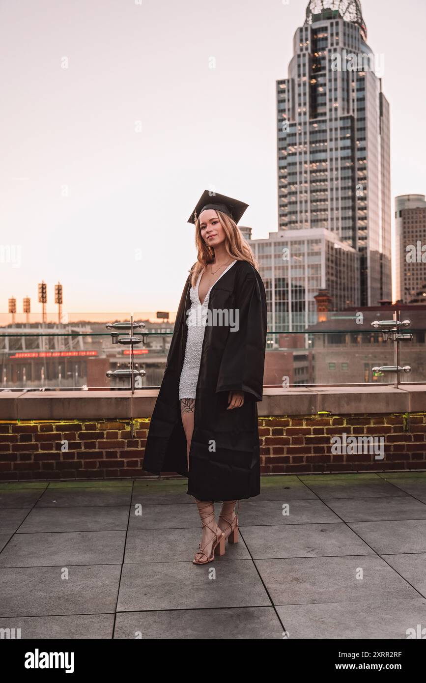 College Graduation Portraits on Rooftop Downtown Stock Photo - Alamy