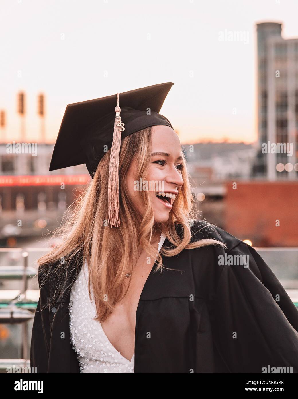 College Graduation Portraits on Rooftop Downtown Stock Photo - Alamy
