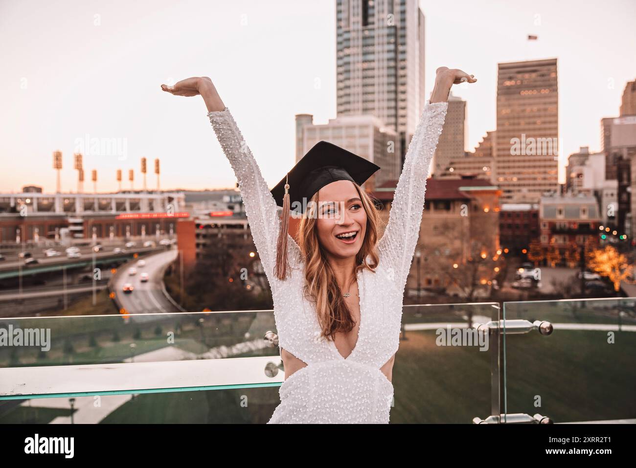 College Graduation Portraits on Rooftop Downtown Stock Photo - Alamy