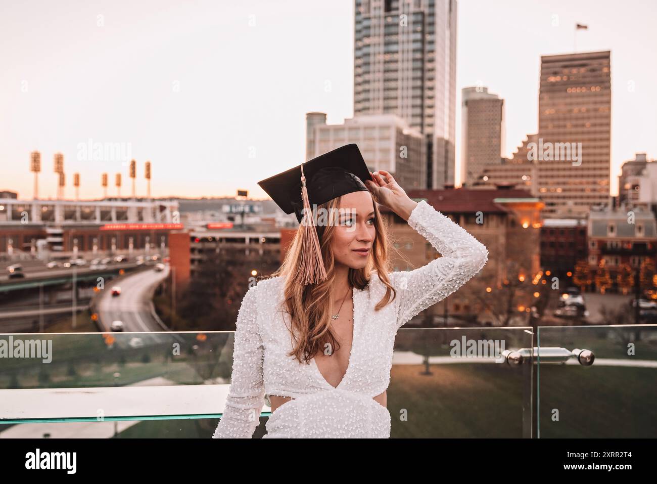 College Graduation Portraits on Rooftop Downtown Stock Photo - Alamy