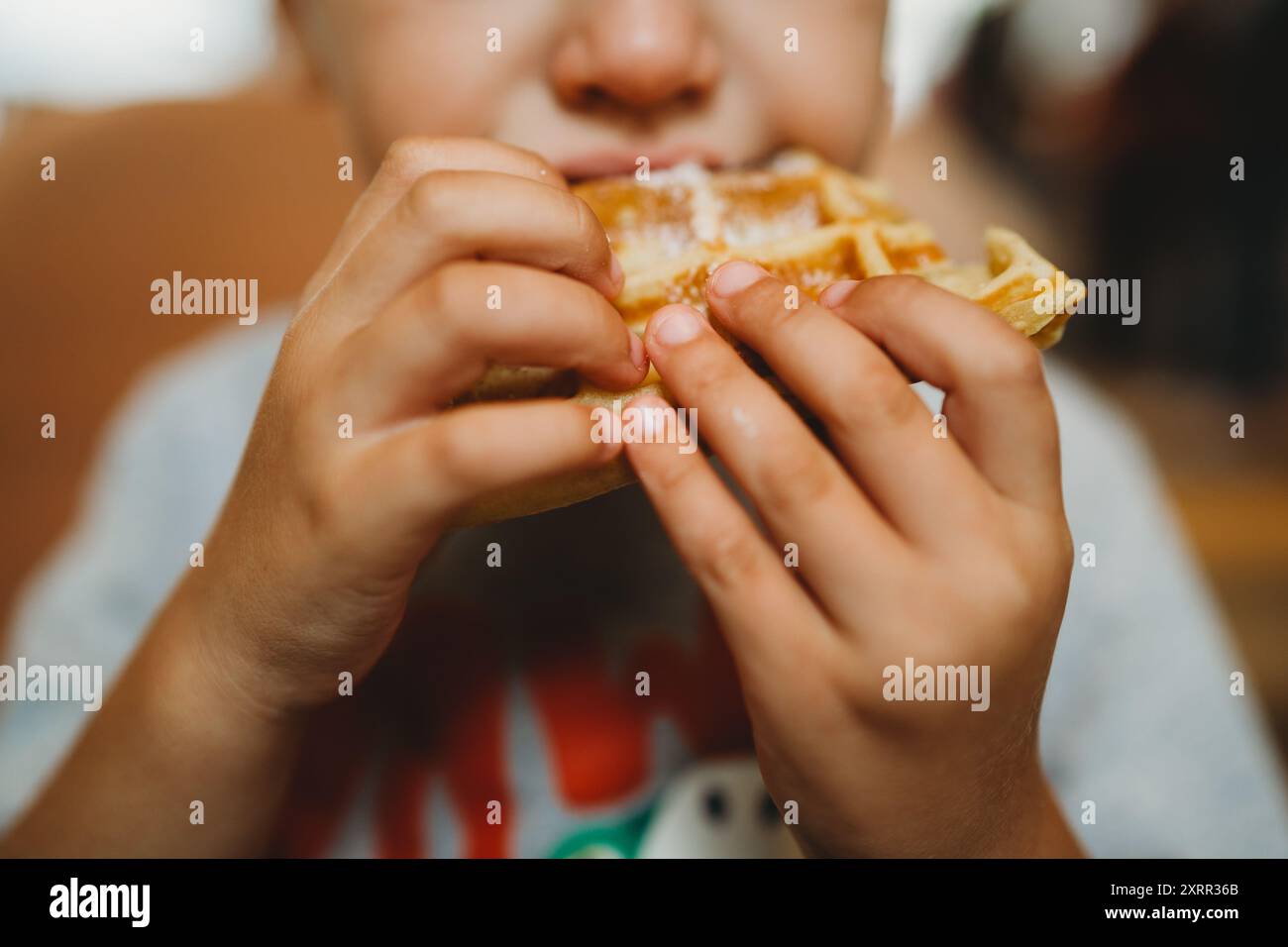 Child young boy eating bakery hi-res stock photography and images - Alamy