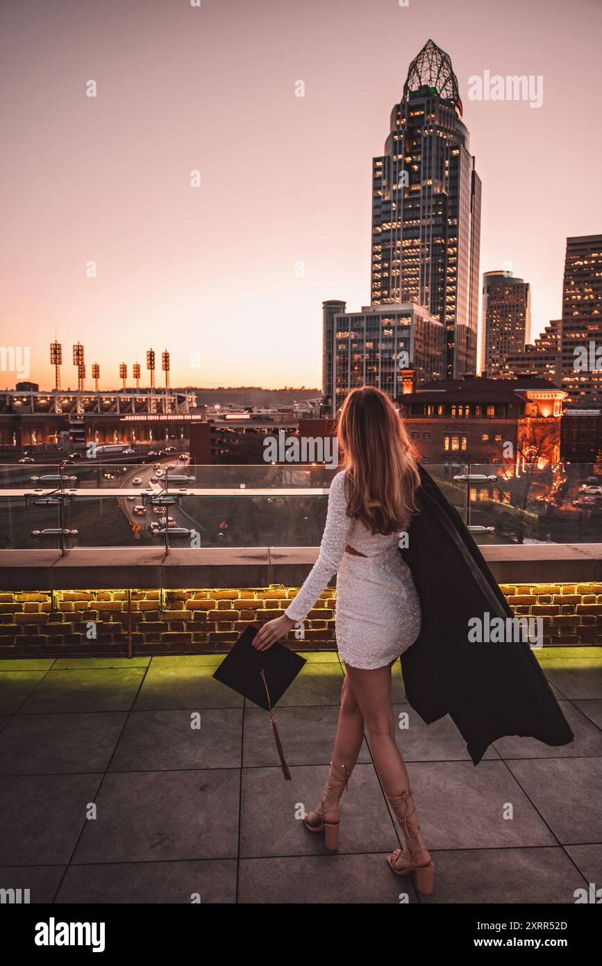College Graduation Portraits on Rooftop Downtown Stock Photo - Alamy