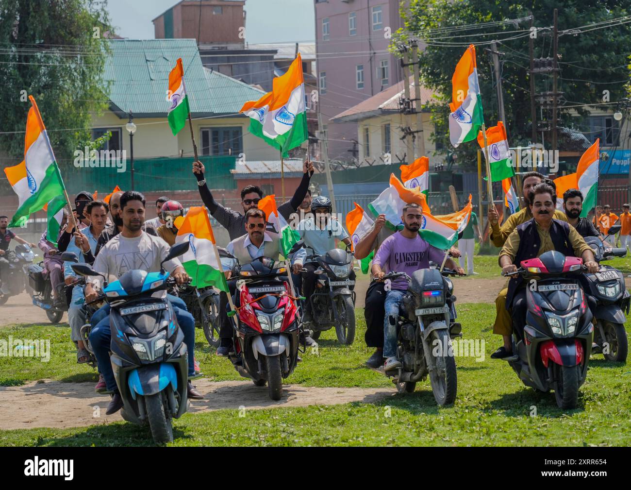 Bharatiya Janata Party (BJP) supporters participate in a motorcycle ...
