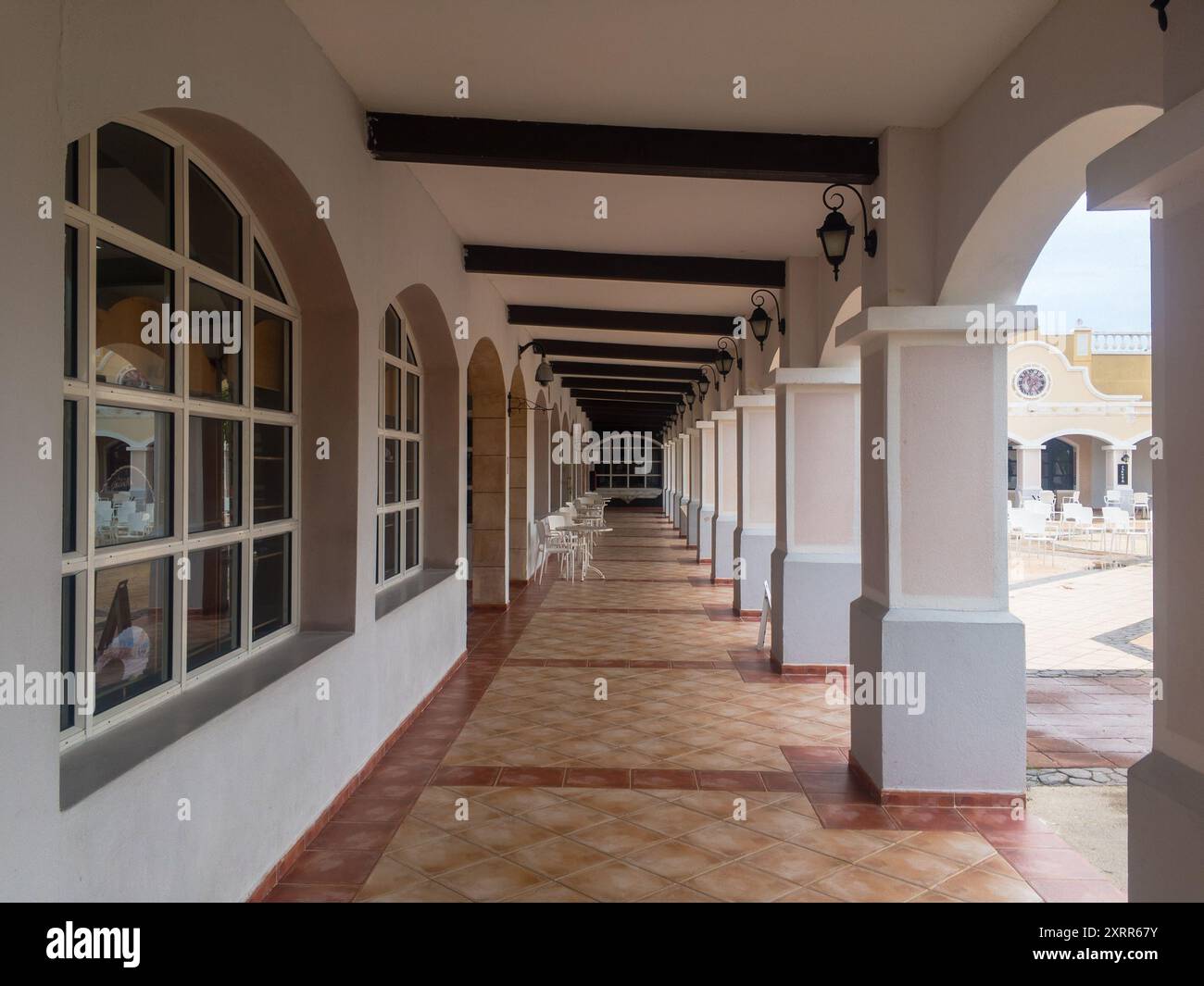 Archway in colonial Spanish style in holiday resort, generic luxury ...
