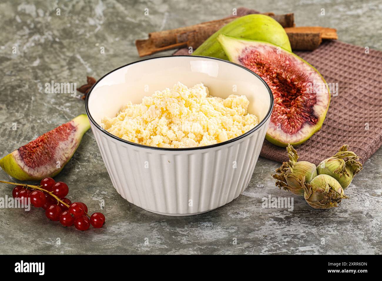 Delicous sheep cottage cheese curd served fig Stock Photo - Alamy