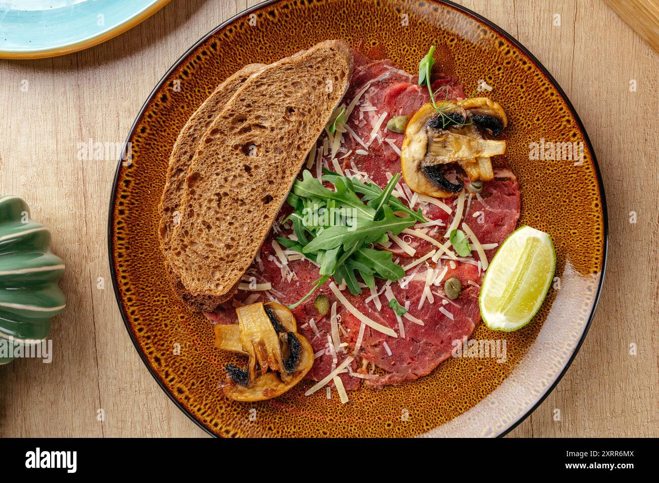 meat appetizer carpaccio. restaurant menu Stock Photo - Alamy