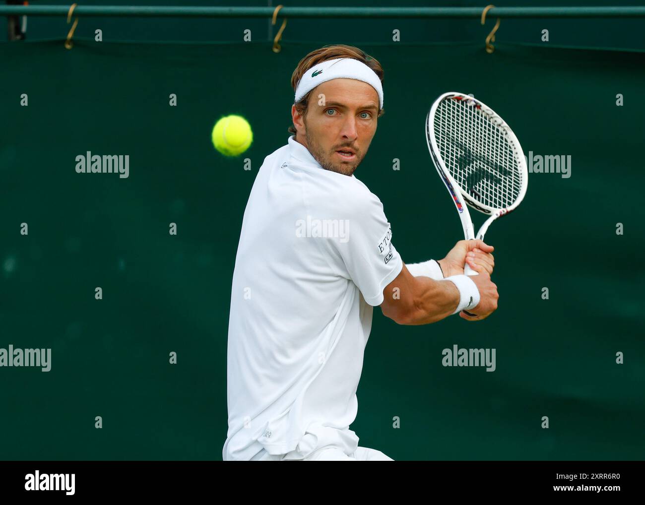 French tennis player Arthur Rinderknech in action at the 2024 Wimbledon ...