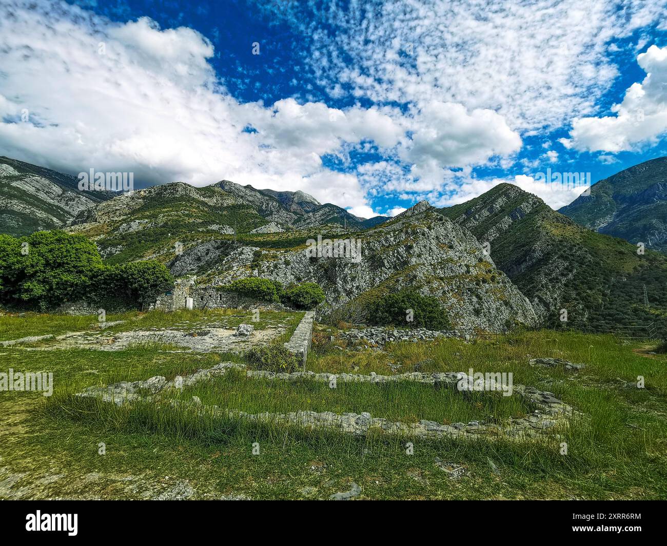 Old Ruins in Kotor with Mountains and Blue Skies Stock Photo - Alamy