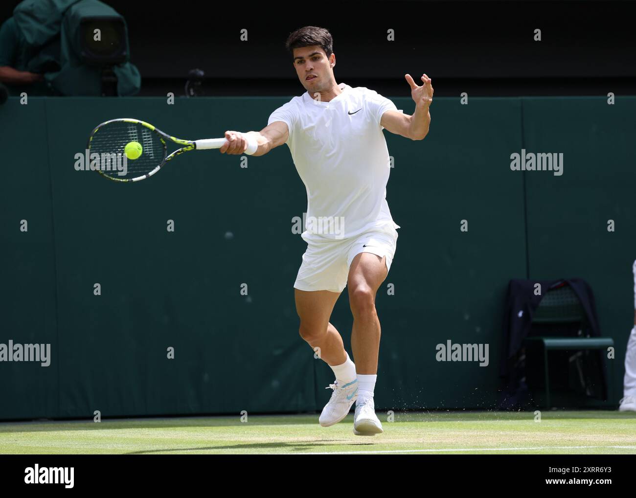 Spanish tennis player Carlos Alcaraz in action at the 2024 Wimbledon ...