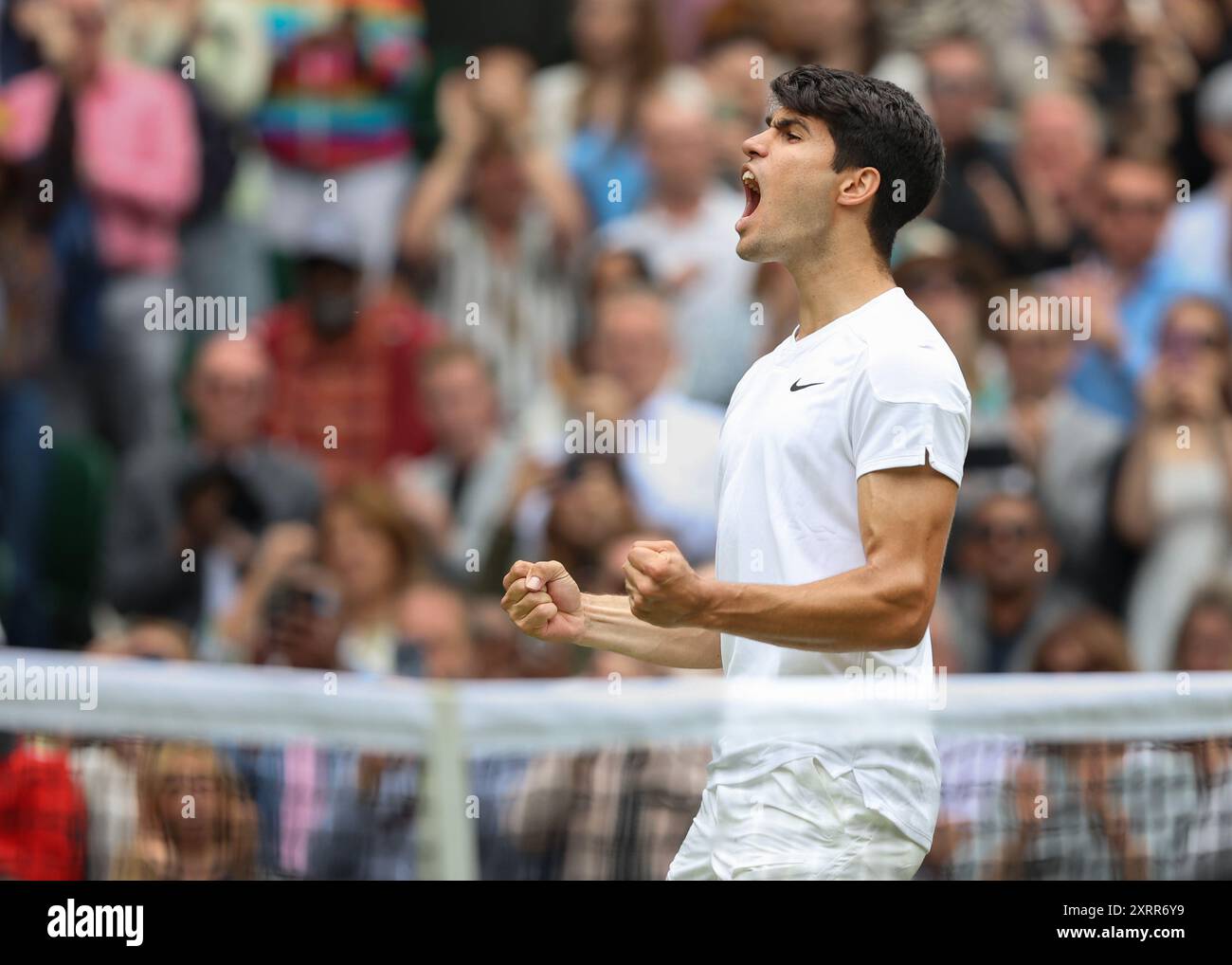 Spanish tennis player Carlos Alcaraz celebrating at the 2024 Wimbledon ...