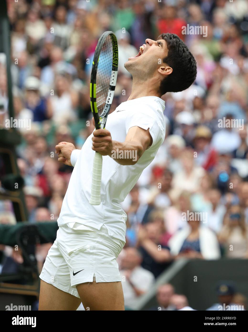 Spanish tennis player Carlos Alcaraz celebrating at the 2024 Wimbledon ...