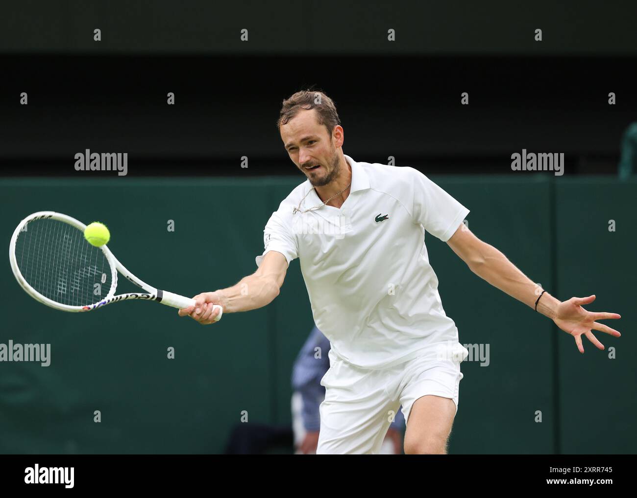 Russian tennis player Daniil Medvedev in action at the 2024 Wimbledon ...