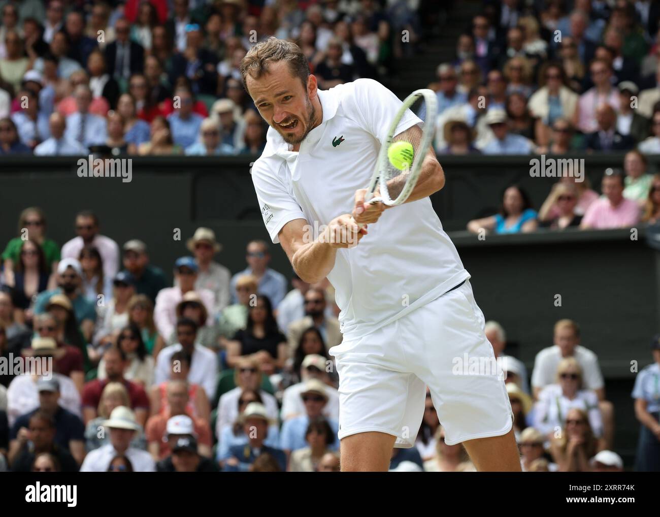 Russian tennis player Daniil Medvedev in action at the 2024 Wimbledon ...