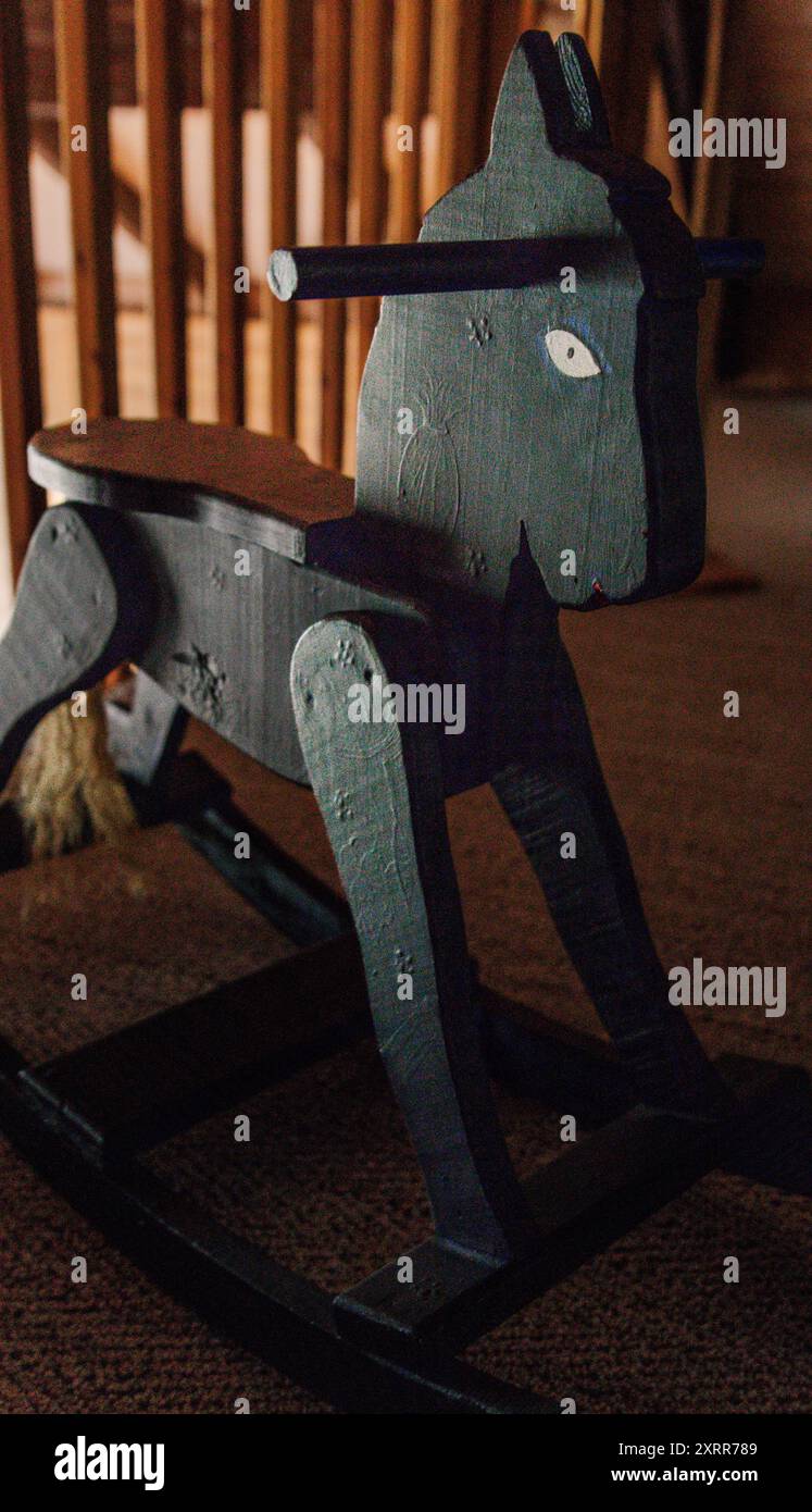 Dark vintage rocking horse hi-res stock photography and images - Alamy