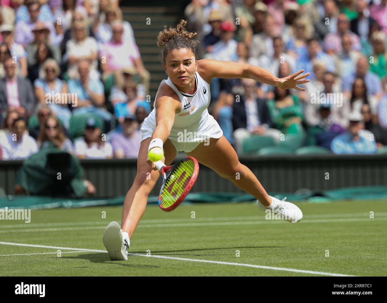 Italian tennis player Jasmine Paolini in action at the 2024 Wimbledon ...