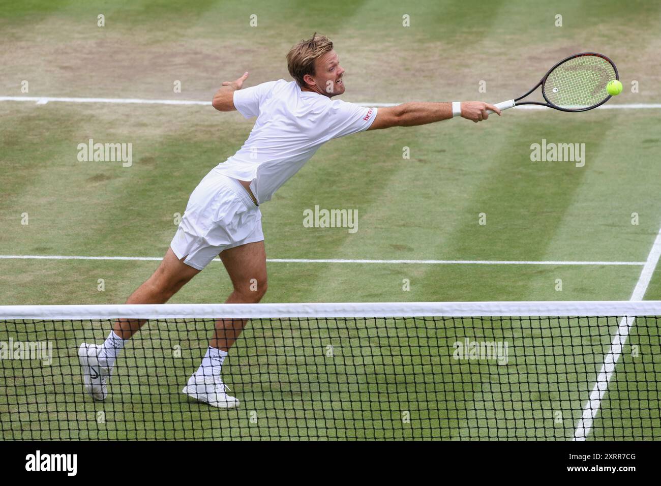 German tennis player Kevin Krawietz in action at the 2024 Wimbledon ...