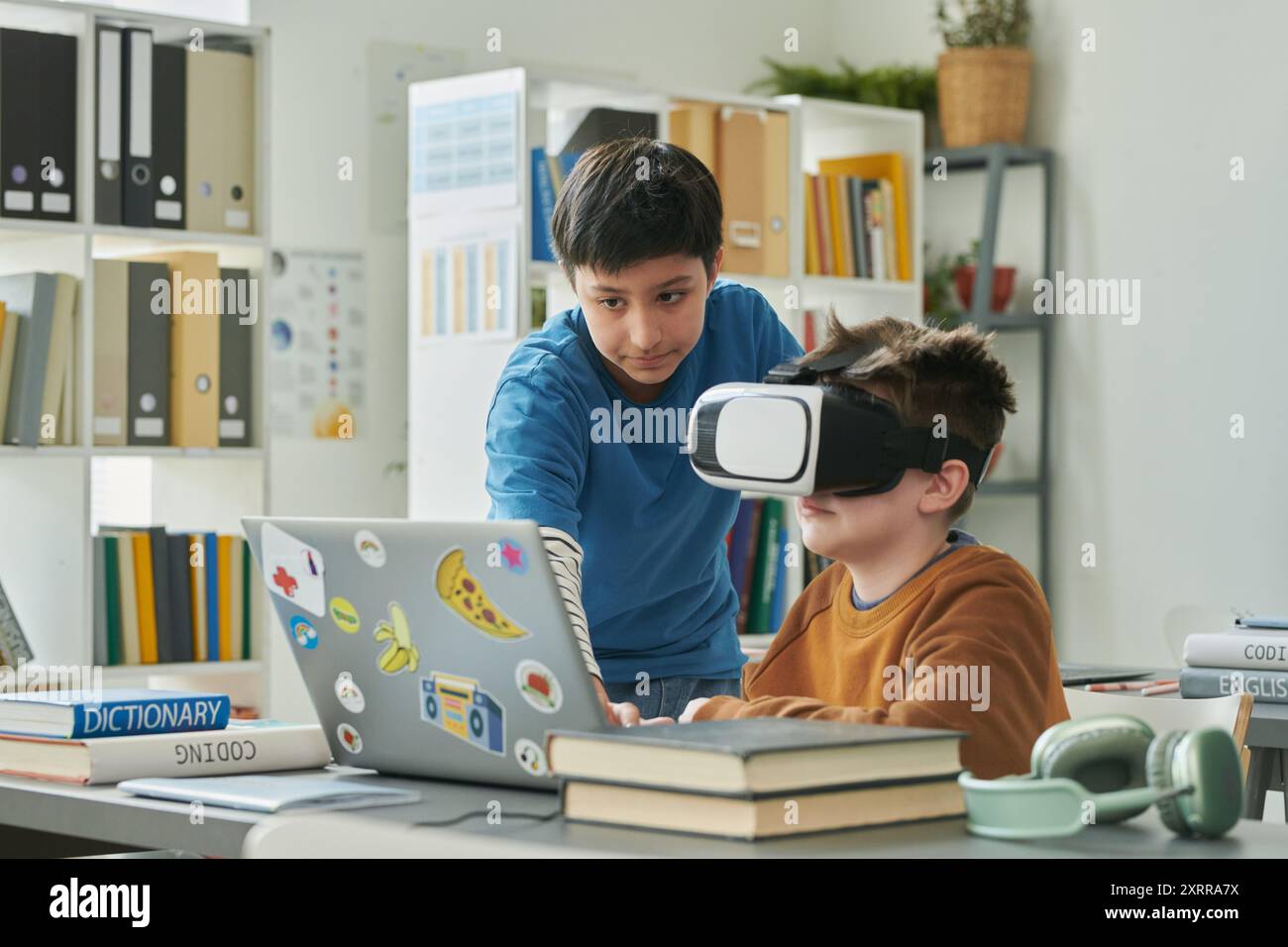 Boys using VR Technology in School Stock Photo - Alamy
