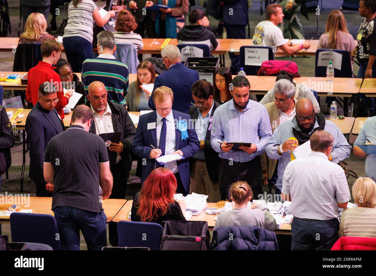 Counting taking place on the floor of the ICC in Birmingham. The 2024 ...