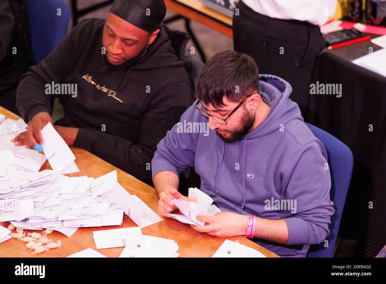 Counting taking place on the floor of the ICC in Birmingham. The 2024 ...