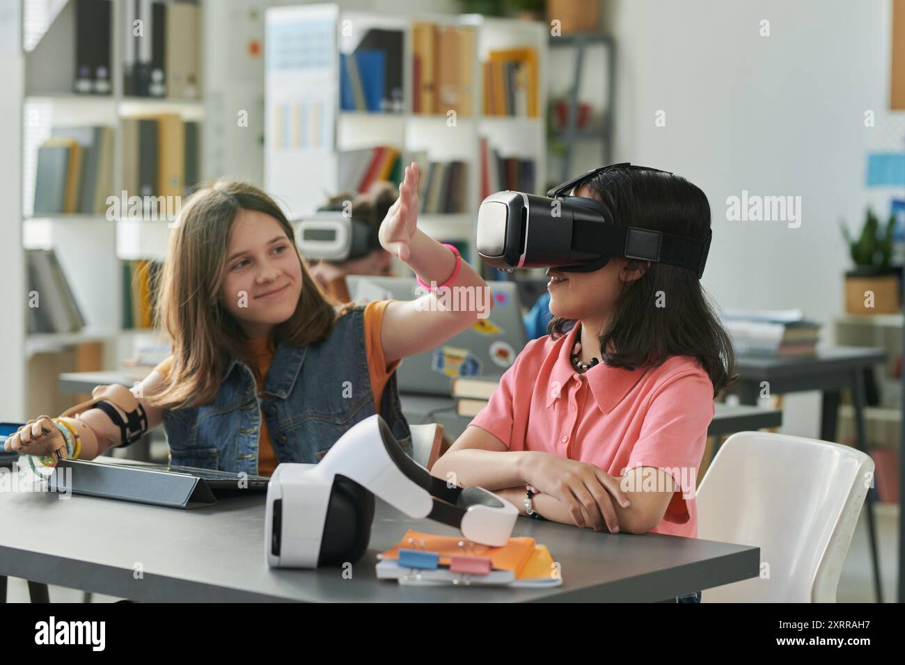 Girls using VR Enjoying Computer Class Stock Photo - Alamy