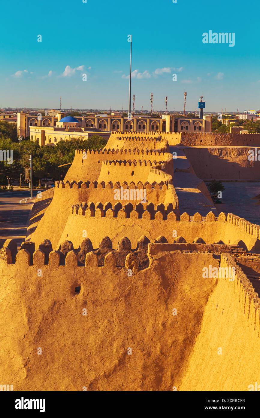 The city walls of the ancient city of Khiva at sunset. Khiva ...